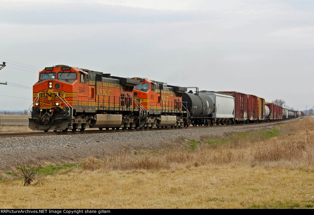 BNSF 5044 Heads up a Nb mixed freight.